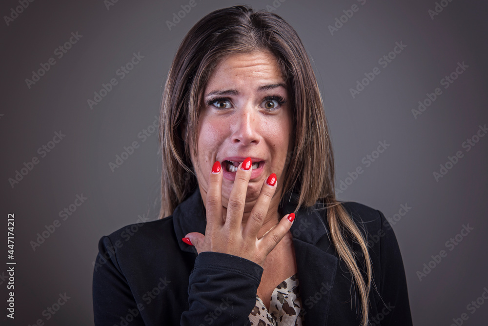 Young lady showing an expression of repulsion, hand gesture Stock Photo ...
