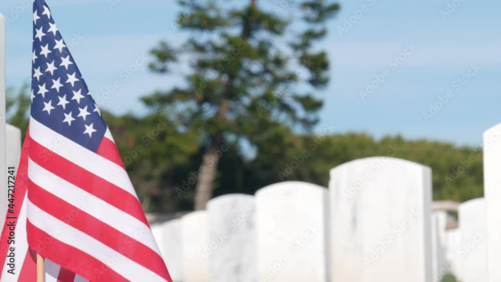 Tombstones and american flag, national memorial cemetery, military ...