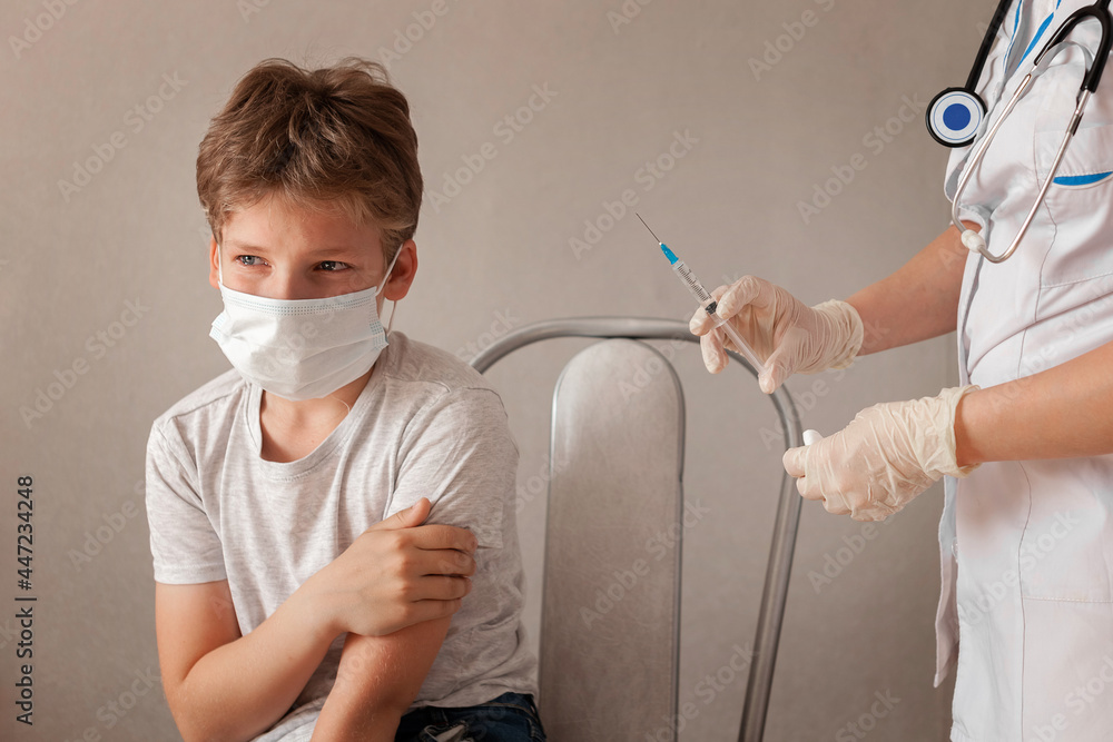 schoolboy medical mask crying, afraid injection, doctor standing rubber ...