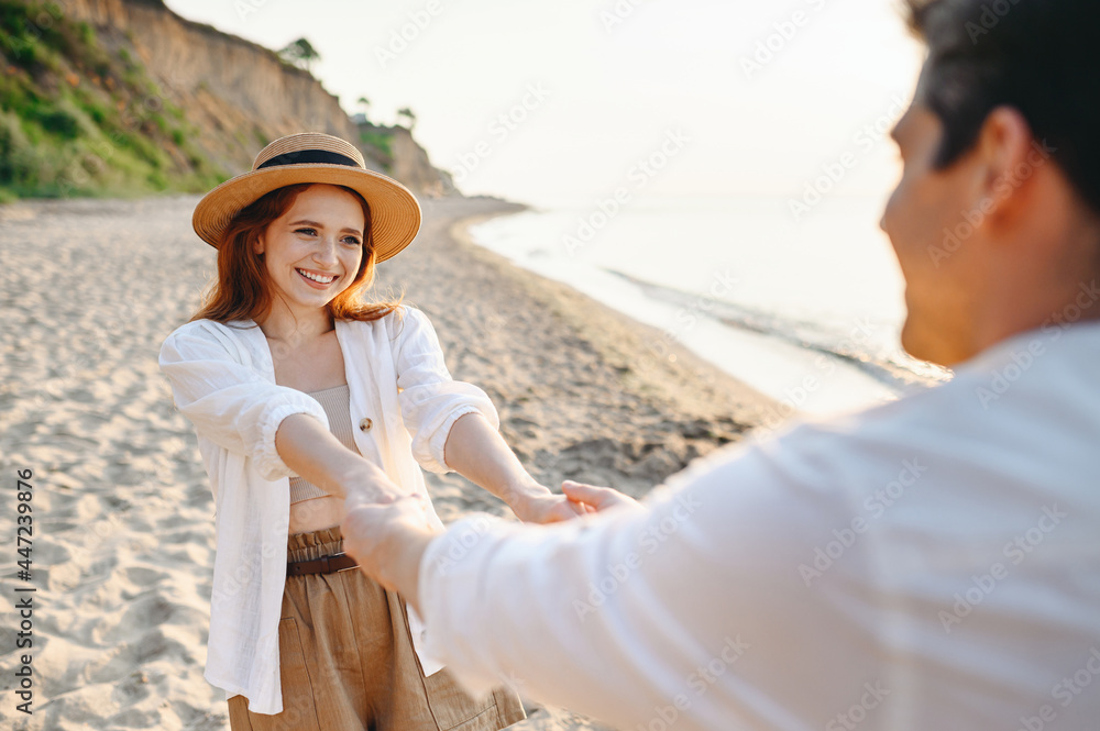 Young smiling fun couple two friends family man woman in white shirt ...