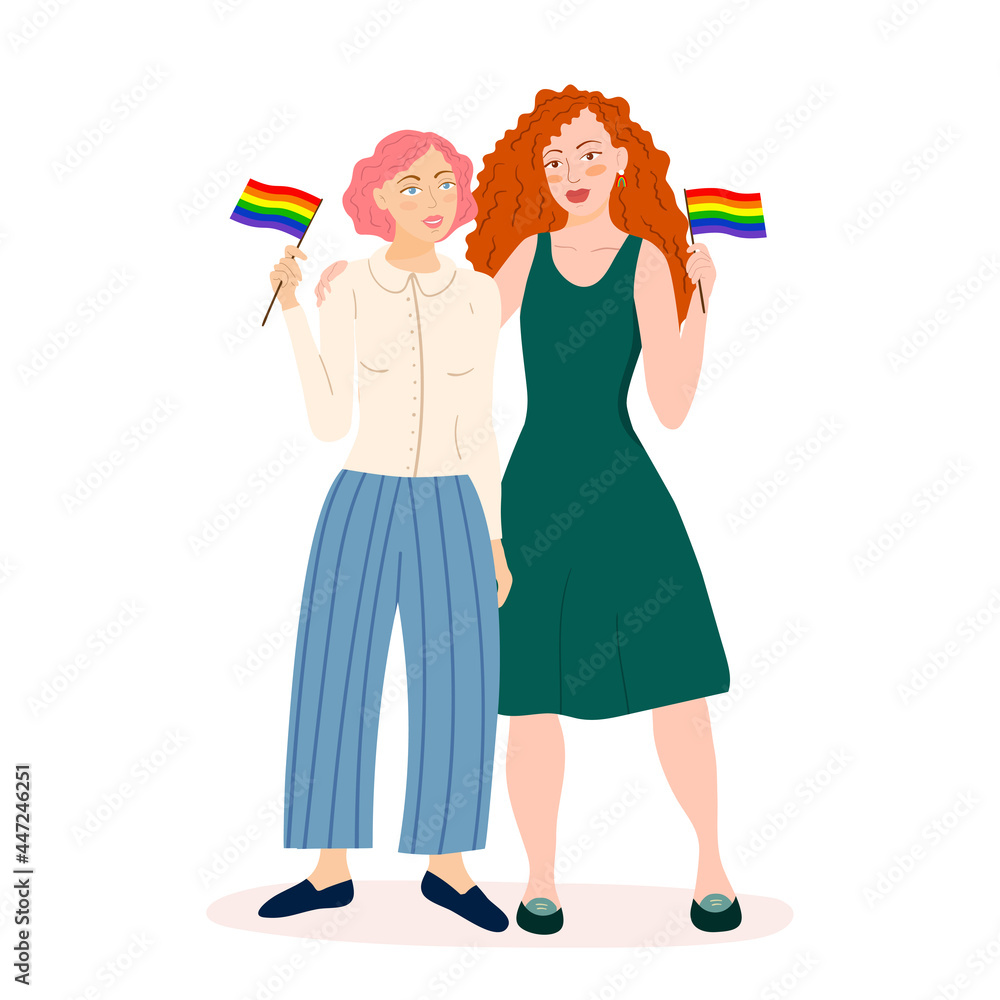 Two lesbian girls are holding flags of the day of the gay pride parade ...