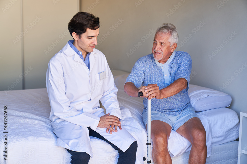 Senior with walking aid talks to a geriatric nurse Stock Photo | Adobe ...