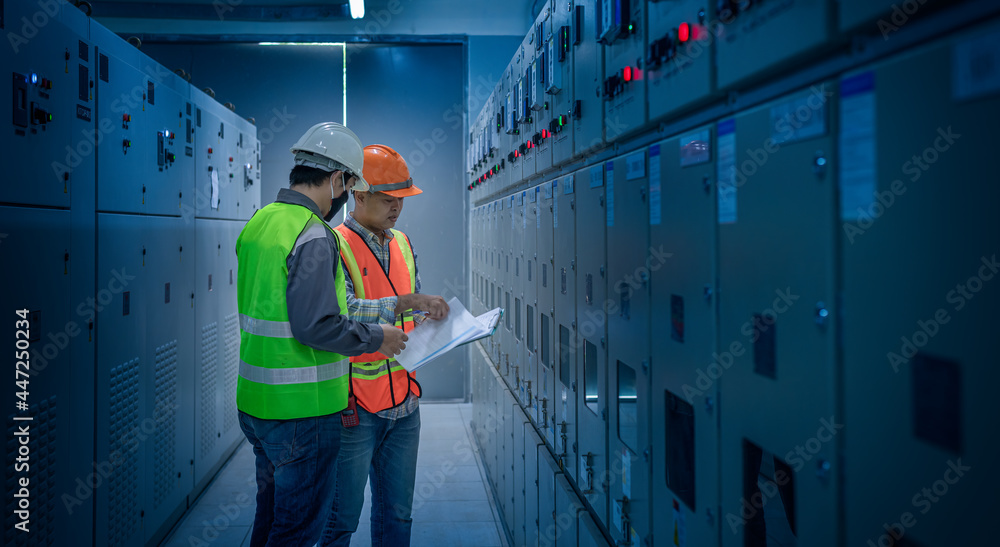 engineer checking and inspecting at MDB panel .he working with electric ...