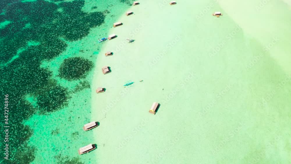 Manlawi Sandbar floating cottages in Caramoan Islands. A floating ...