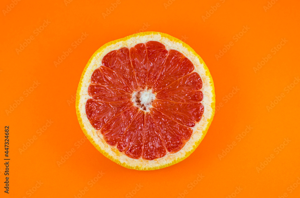 Grapefruit texture inside on the orange background. Citrus close up ...