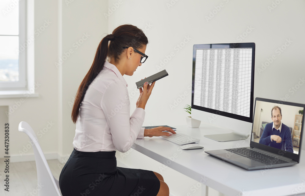 Company auditor, advisor or personal assistant working at office desk ...