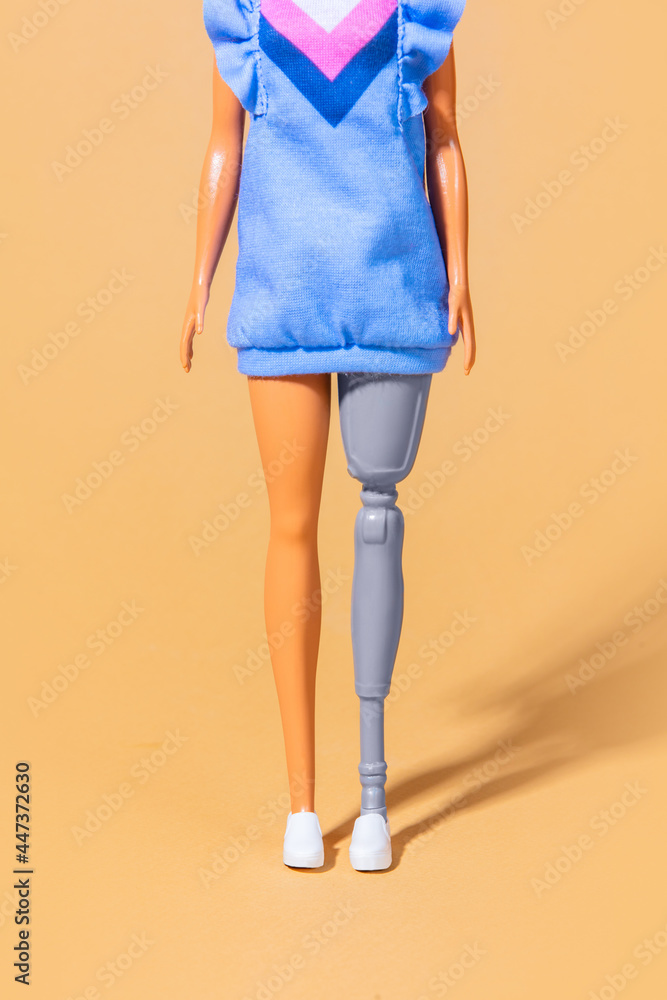 female doll with a prosthetic leg. Focus on low part of body Stock ...