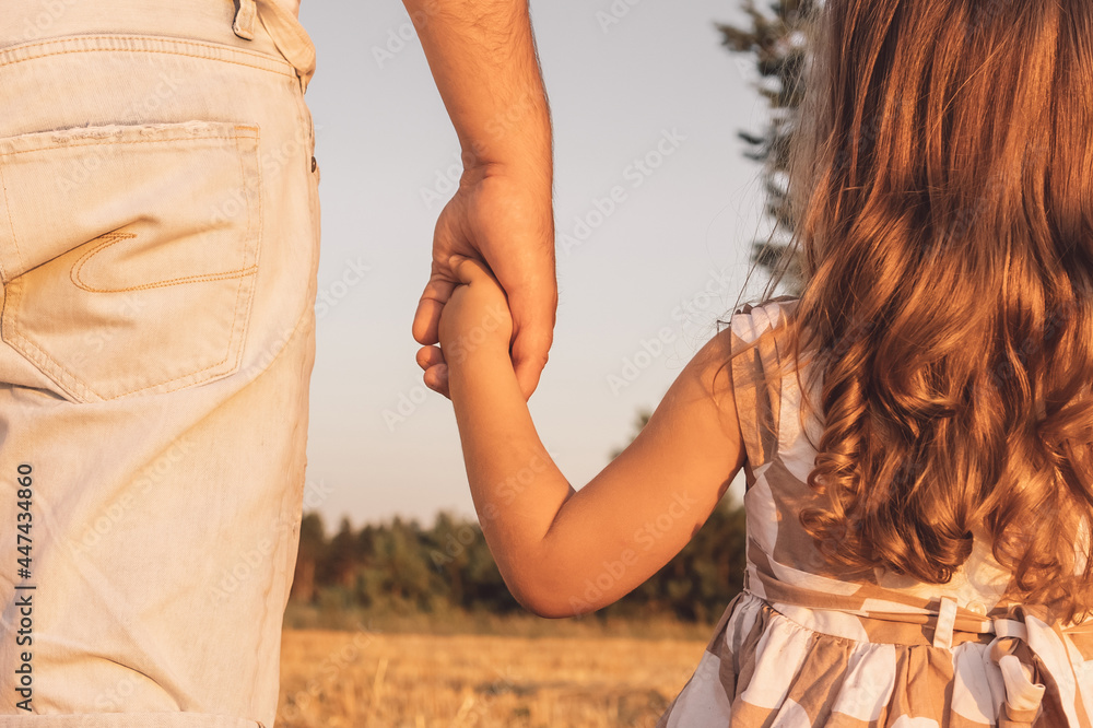 Fathers And Daughters Holding Hands