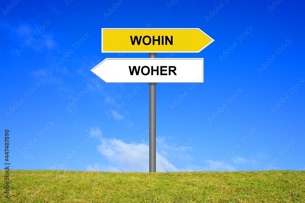 Schild Wegweiser zeigt Woher und Wohin foto de Stock | Adobe Stock