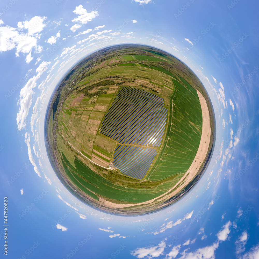 Little planet with big sustainable electric power plant with many rows ...