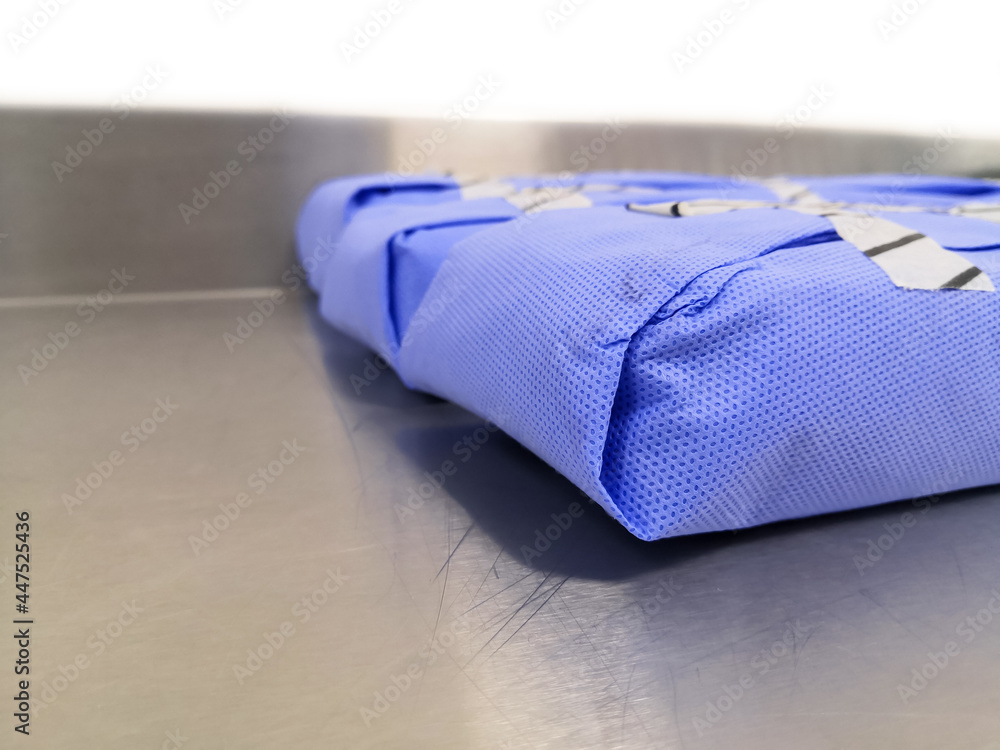 Side View Of Surgical Instruments Set Wrapped With Disposable Blue ...