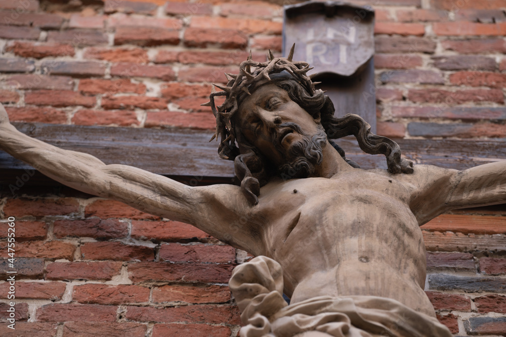 Holy cross with crucified Jesus Christ. Bottom view of an ancient ...