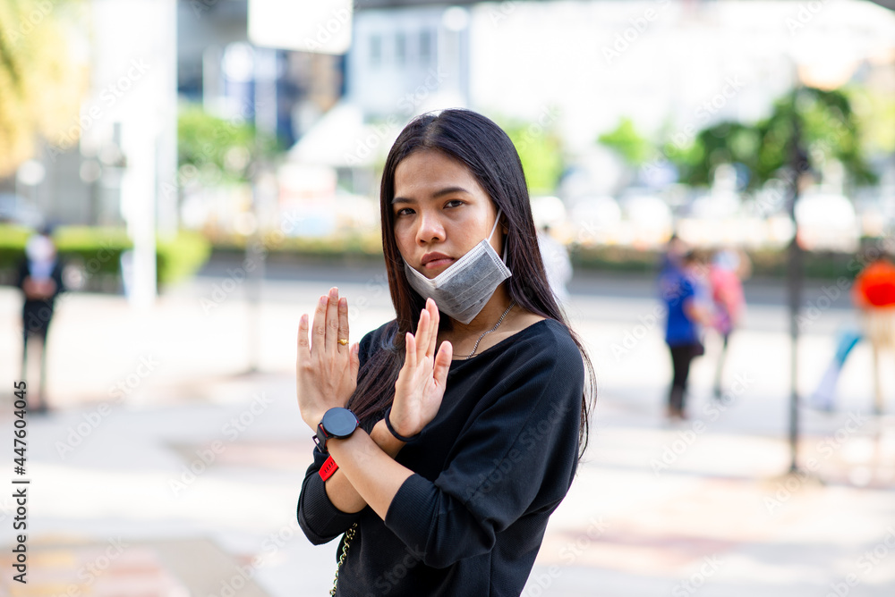 Asian woman don't wear a face mask for protection virus or pollution ...