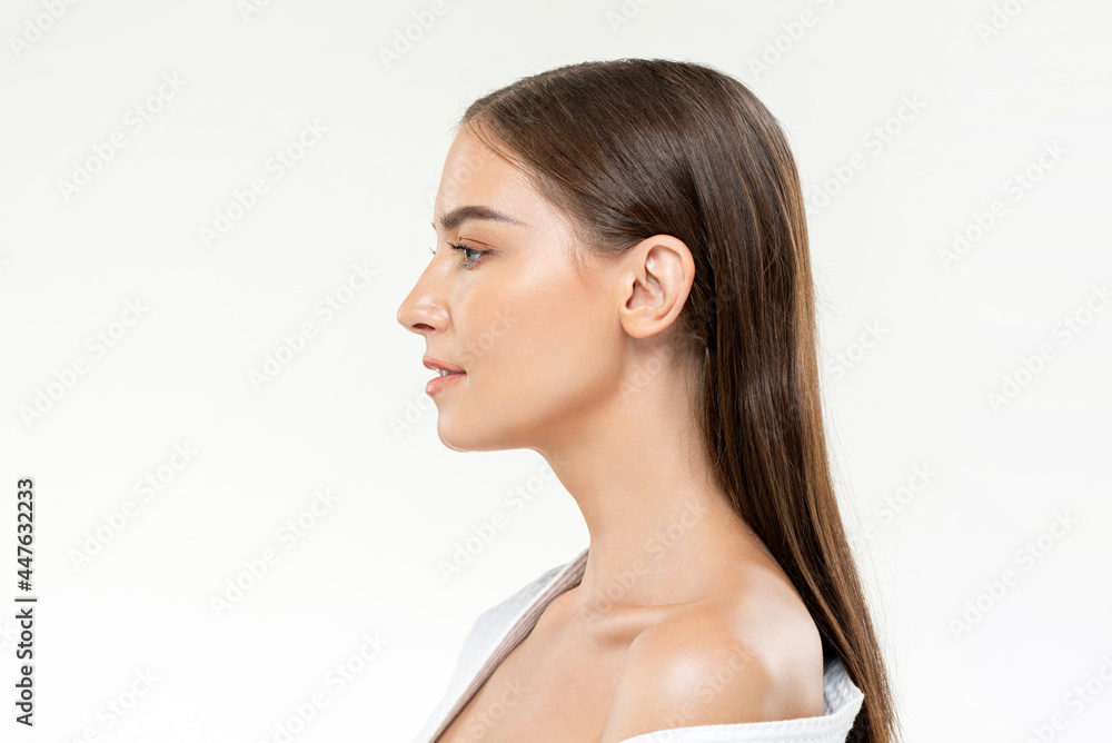 Side view beauty shot portrait of young Caucasian woman on isolated ...
