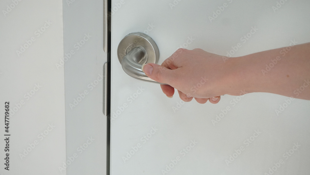 hand opening door Stock Photo | Adobe Stock