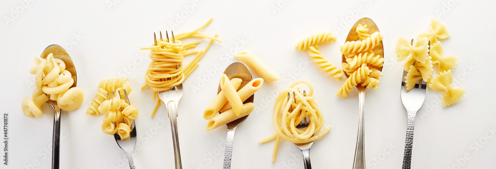 Types of spaghetti, noodles, and pasta on the forks and spoons in the ...