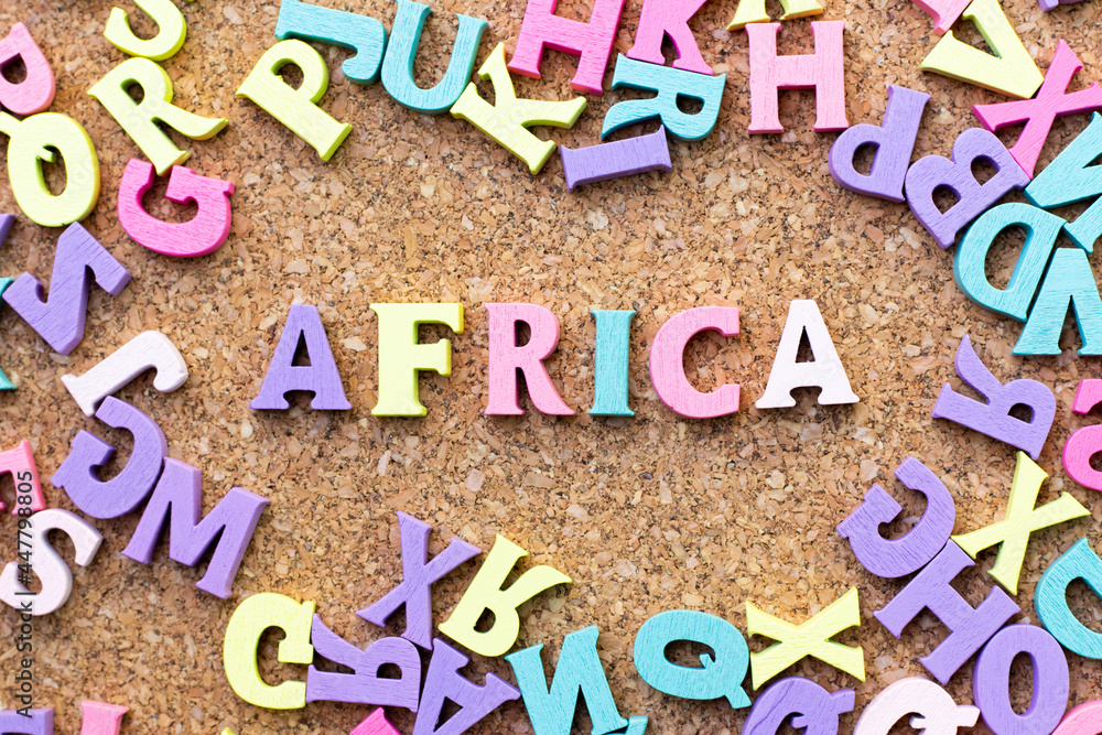 Color alphabet in word africa with another letter as frame on cork ...