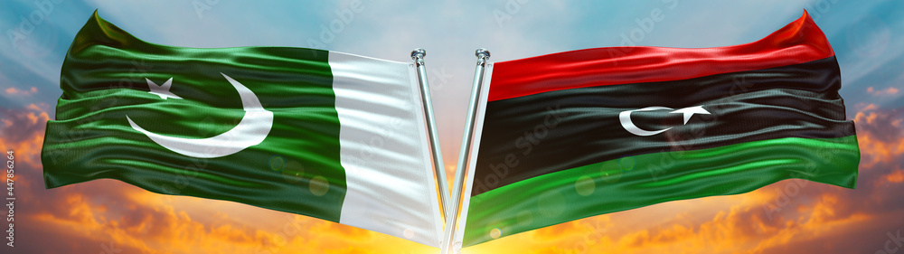 Pakistan Flag and Libya flag waving with texture sky Cloud and sunset ...