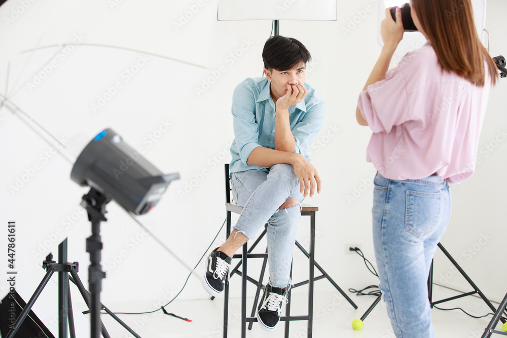 Asian friendly confident long brown hair female photographer smile hold ...