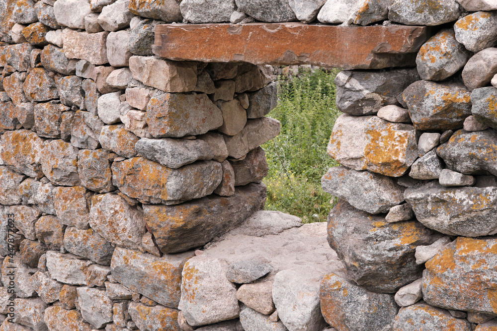 Stone wall with window in traditional balkarian house in old Verhnyaya ...