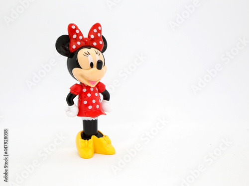 Minnie Mouse in her classic red polka dot dress. Toy. Cartoon character ...