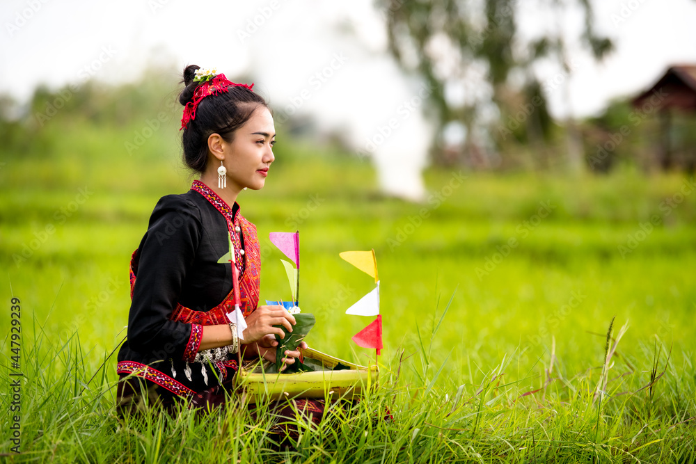 Beautiful Thai girls with local traditional costumes at the traditional ...