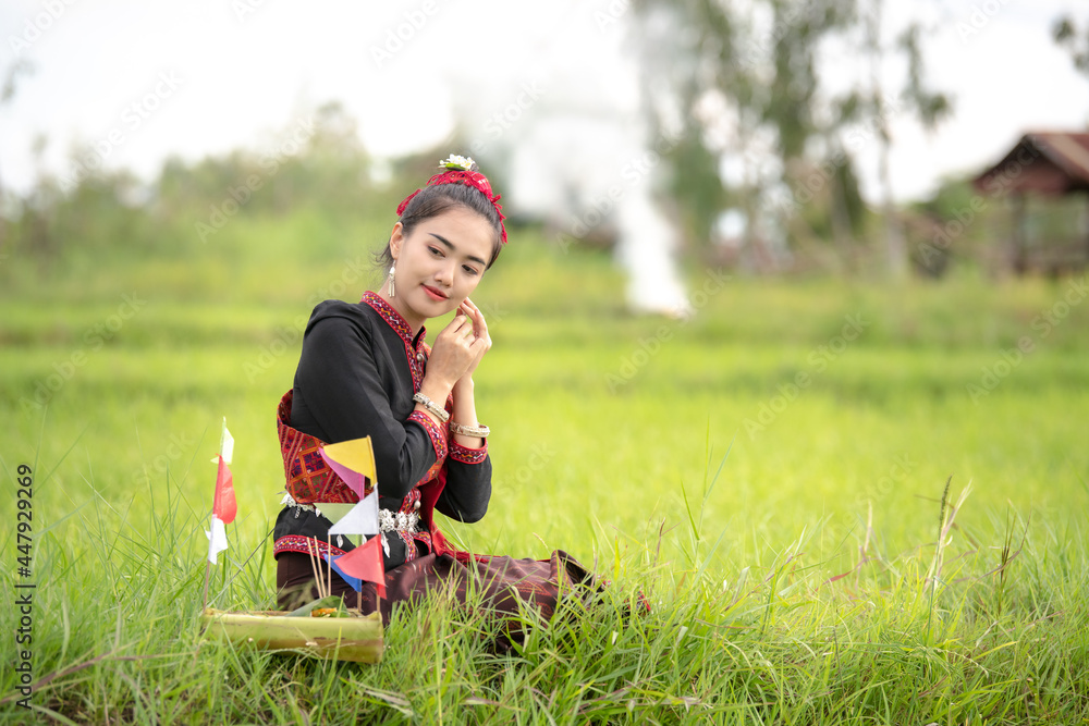 Beautiful Thai girls with local traditional costumes at the traditional ...