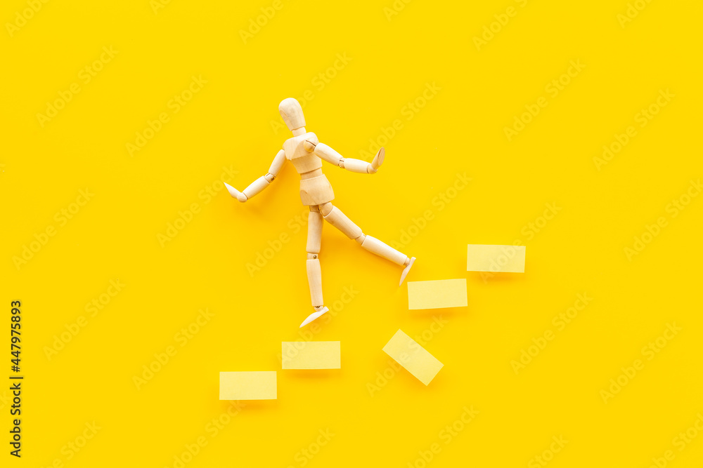 Man mannequin figure falling down from stairs. Accident failure and ...