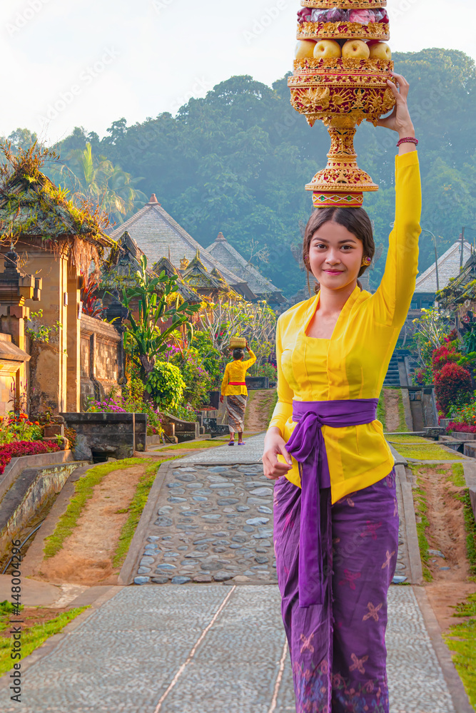 Portrait of balinese girl in traditional costume - Penglipuran is a ...
