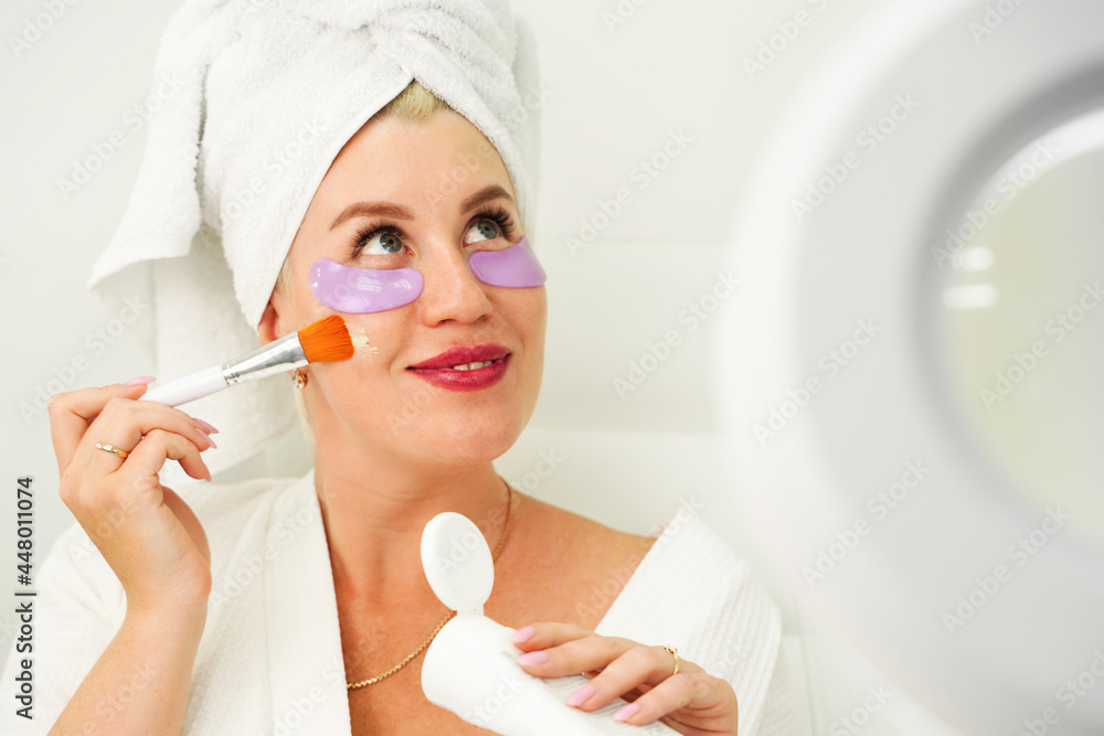 Beautiful Young Woman Applying Organic Cosmetics To Her Skin Stock ...