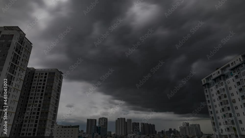 time lapse of passing storm with heavy dark clouds and rain with high ...