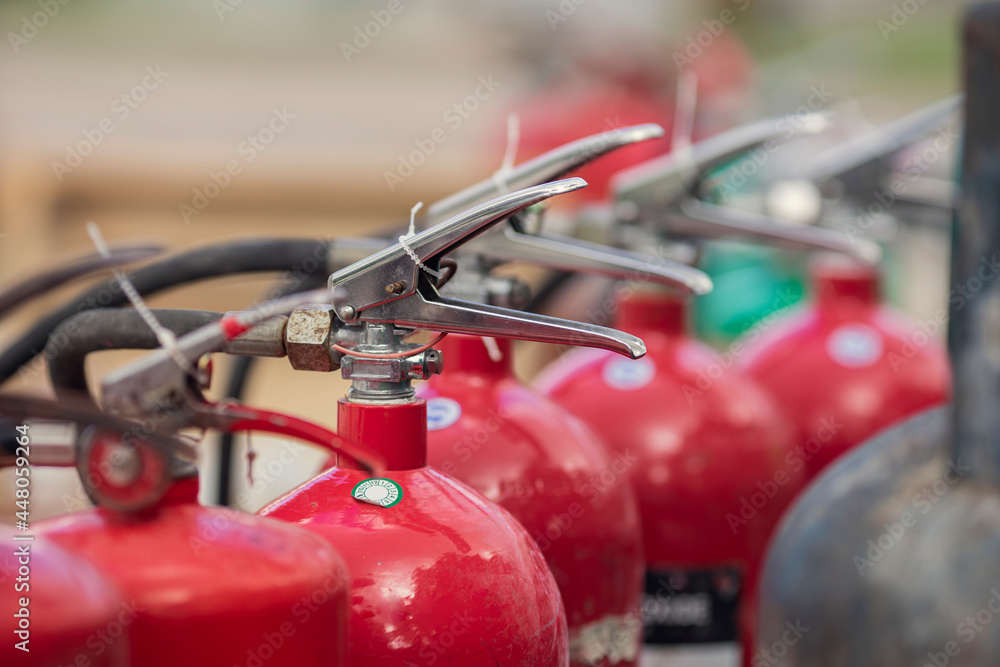 Red tank fire extinguisher. Emergency fire extinguisher gas carbon ...