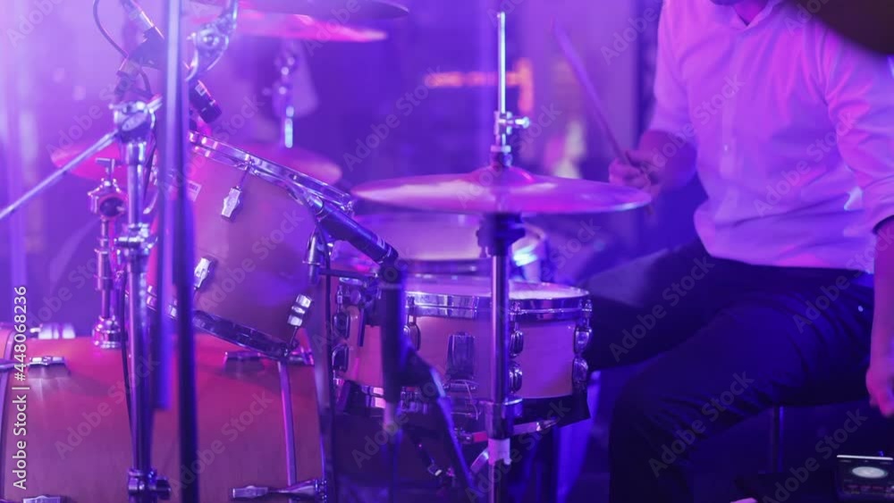 Rock Band Performing at a Concert in a Night Club. Drummer Playing the ...