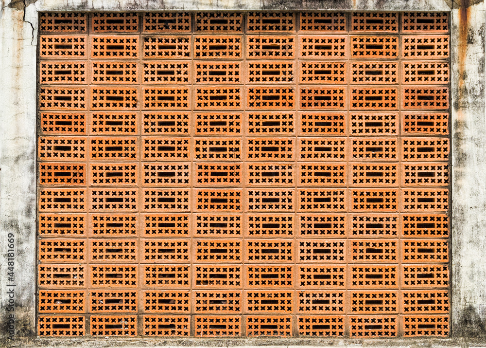 Brickwork of perforated brick wall with frame. For using as background ...