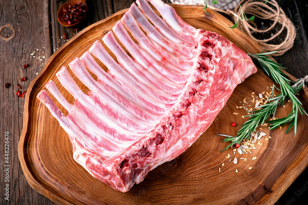 lamb chops raw ribs with seasonings prepared for grilling. Lamb rack ...
