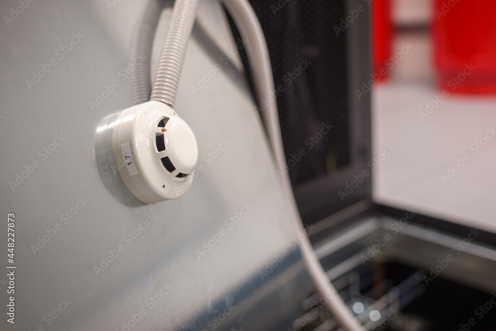 Smoke and fire detector built into the floor connected to clean agent ...