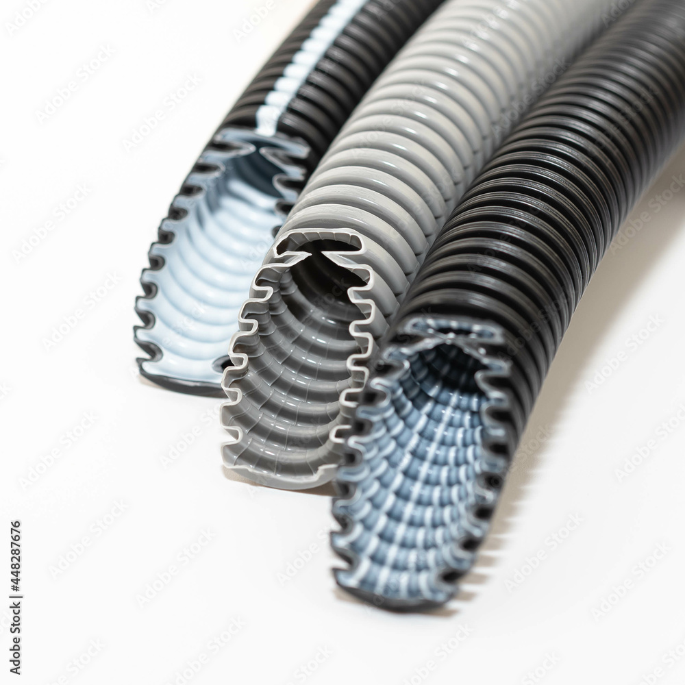 PVC flexible electrical conduit isolated on white background. Plastic ...