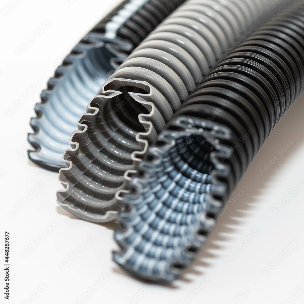 PVC flexible electrical conduit isolated on white background. Plastic ...