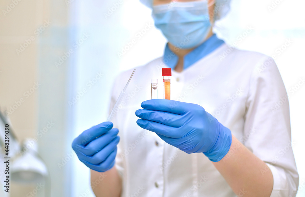 The process of separating blood serum from fibrinogen in the laboratory ...