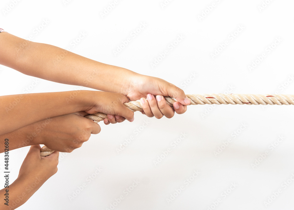 Hands of people pulling the rope together concept of team building ...