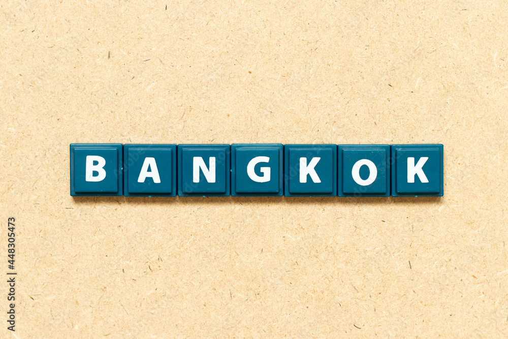 Tile alphabet letter in word bangkok on wood background Stock Photo ...