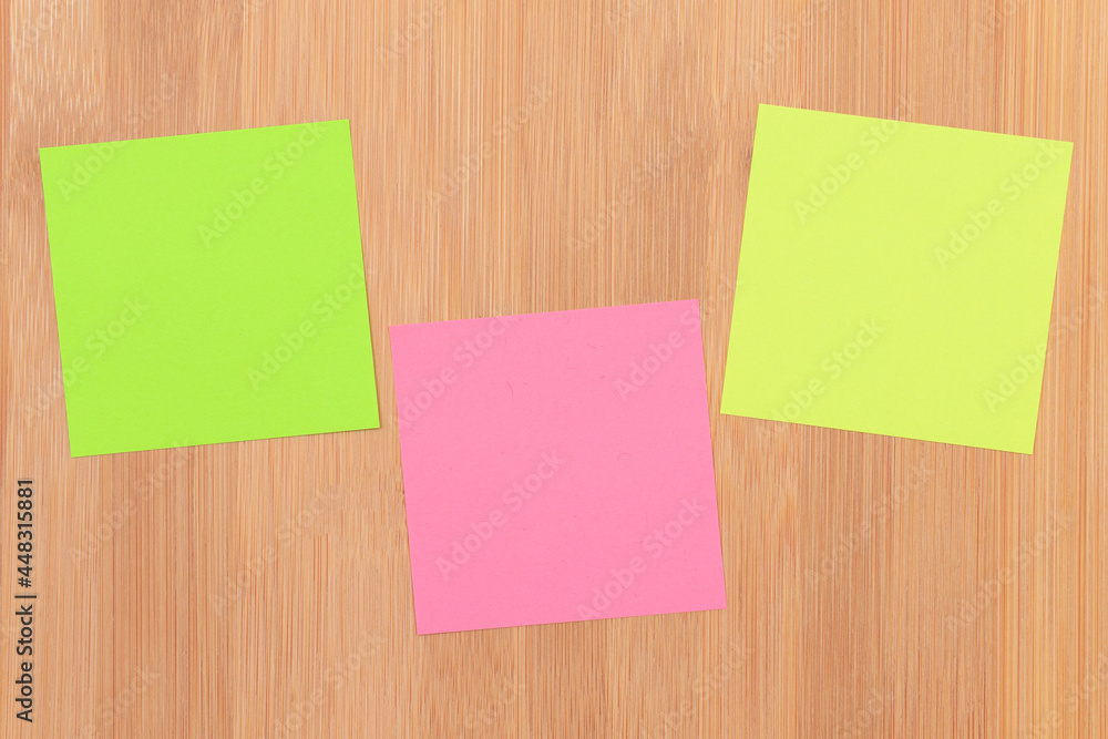 Colored Sticky Notes with Copyspace Pinned to the Wooden Message Board ...