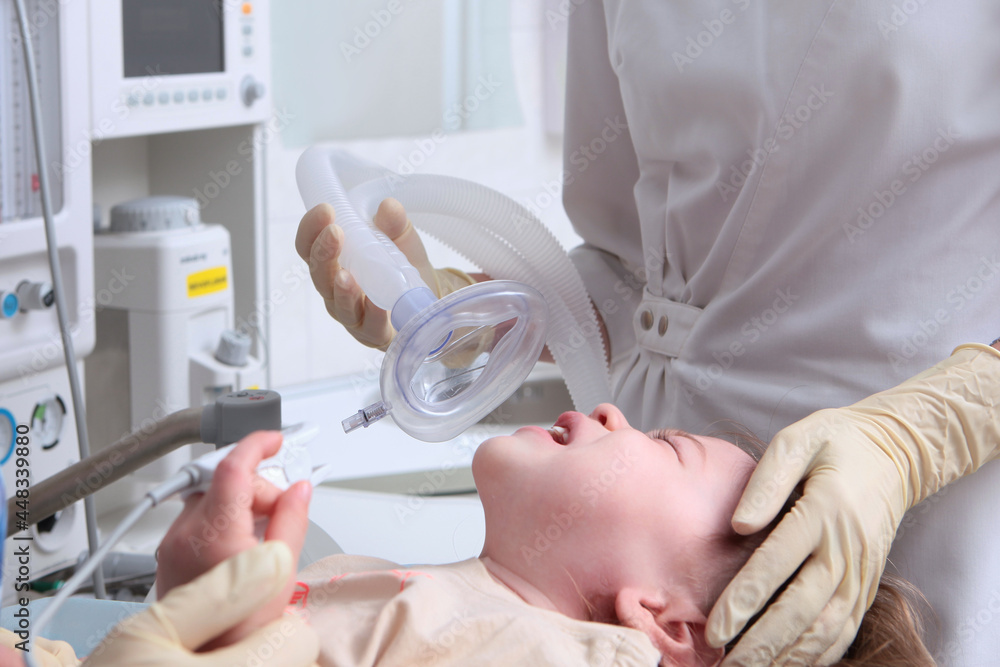 The child's exit from anesthesia. The baby is crying. Anesthesia for a ...
