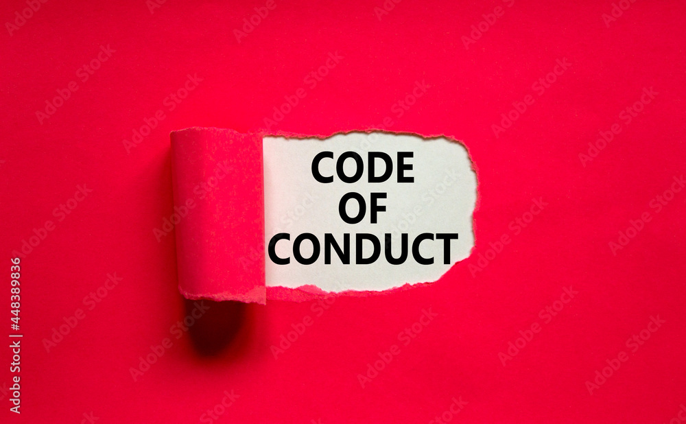 Code of conduct symbol. Words 'Code of conduct' appearing behind torn ...