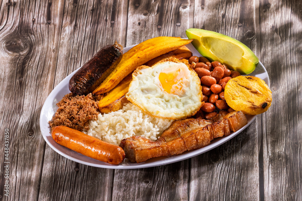 Bandeja paisa most representative dish of Colombia and the insignia of ...