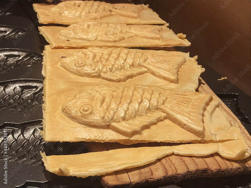 Taiyaki, fish-shaped pastries with red bean filling, Japanese street ...
