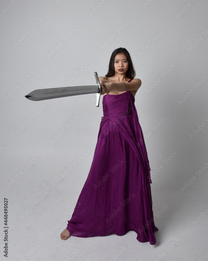 Full length portrait of pretty brunette asian girl wearing purple ...