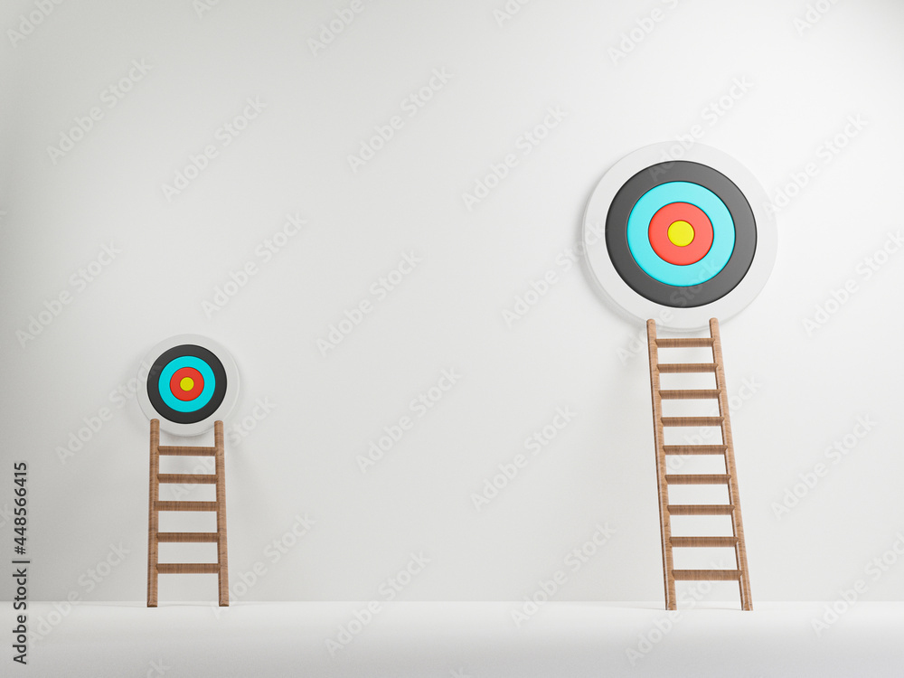 High and low ladder leaned towards to different target board on white ...