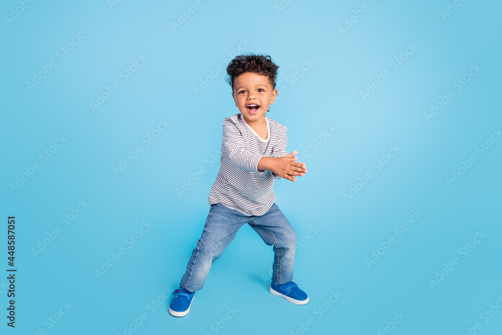 Full length body size view of attractive cheerful boy dancing clapping ...