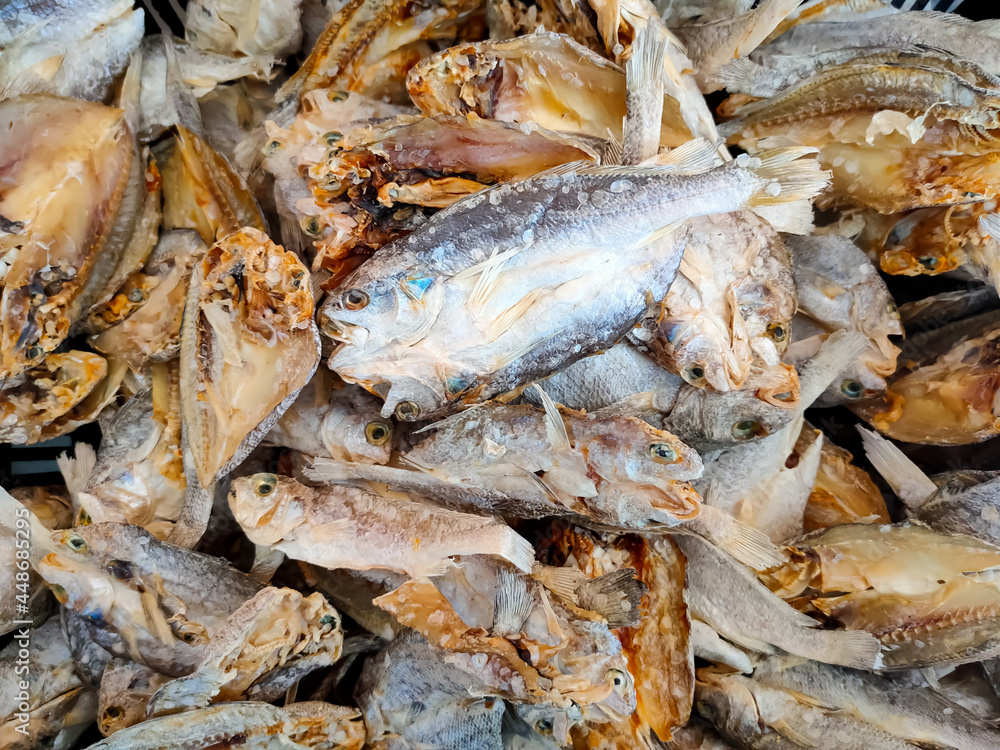 Dried Gelama fish cut in half. The fish is cut in half before being ...